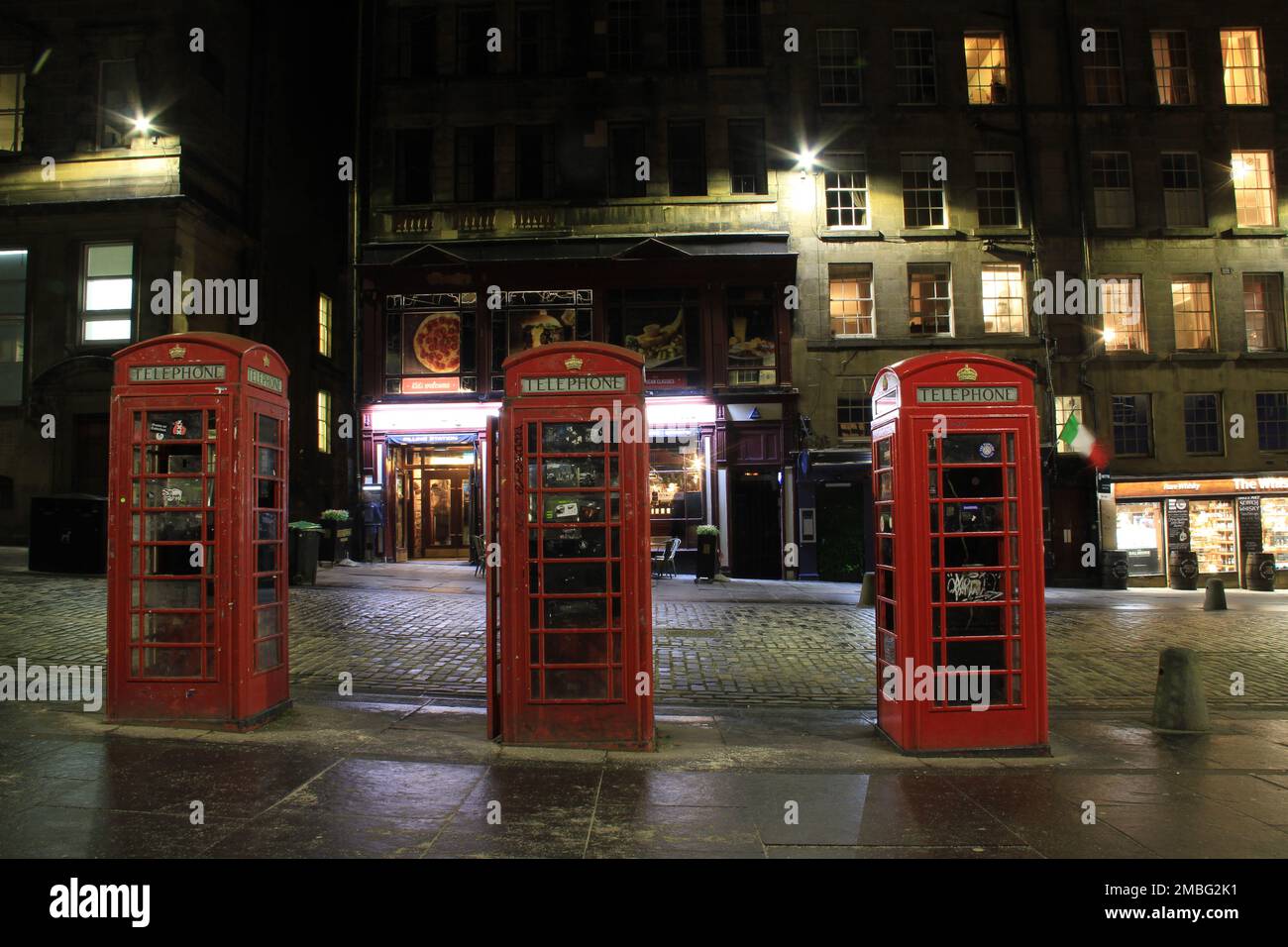 Three old telephone boxes In Edinburgh’s Royal Mile Stock Photo - Alamy