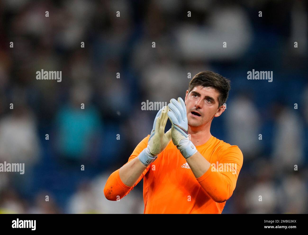 Real Madrid's goalkeeper Thibaut Courtois applauds to fans at the end ...