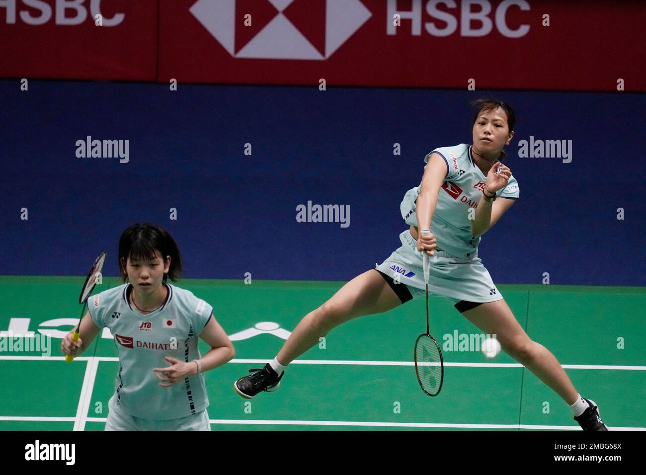 Japan's Yuki Fukushima, right, with Sayaka Hirota, returns a shot to ...