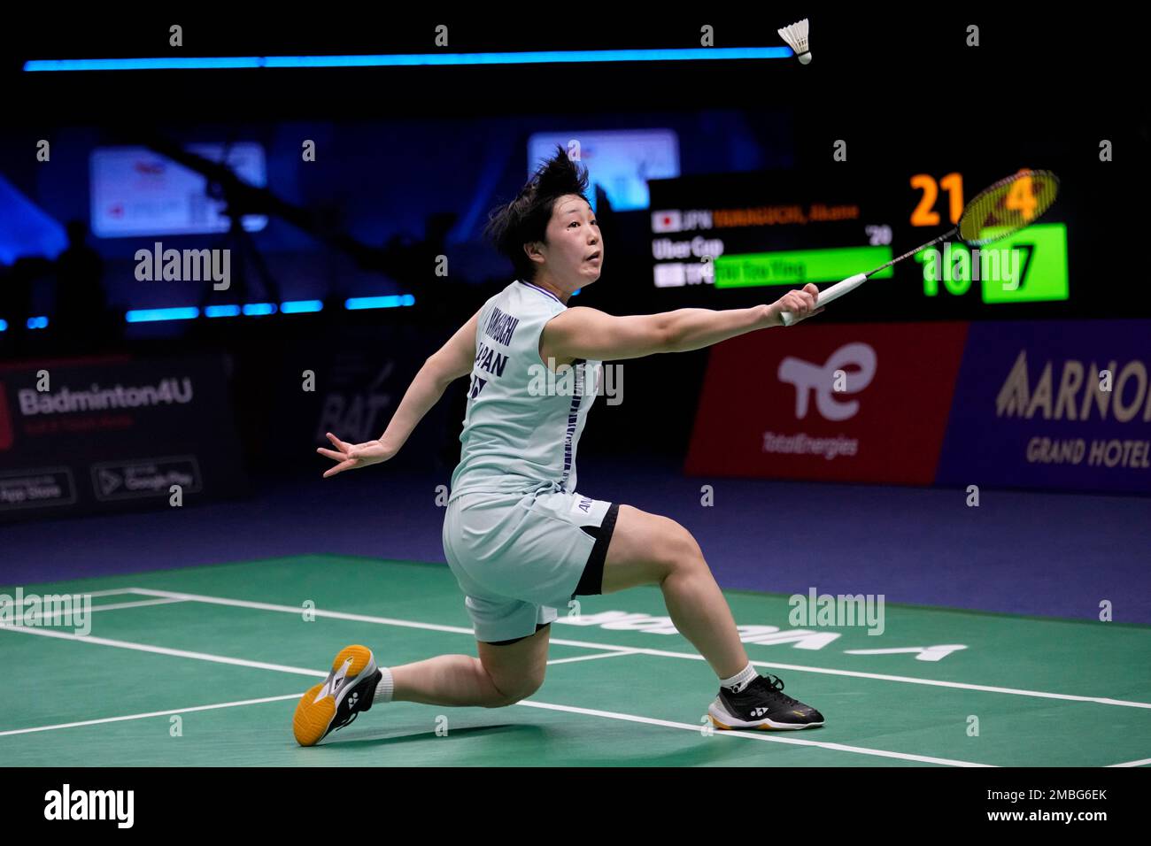 Japan's Akane Yamaguchi tries to return a shot to Taiwan's Tai Tzu Ying ...