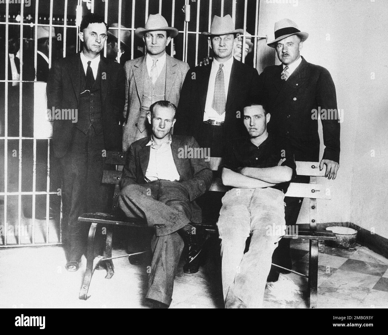 Texas bank robber and alleged killer, Raymond Hamilton, seated left, is ...