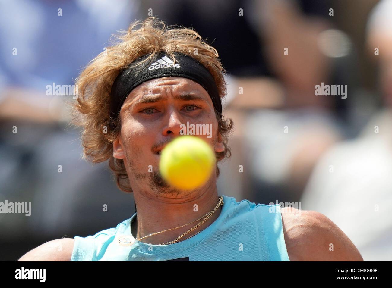Alexander Zverev returns the ball to Sebastian Baez during their match ...