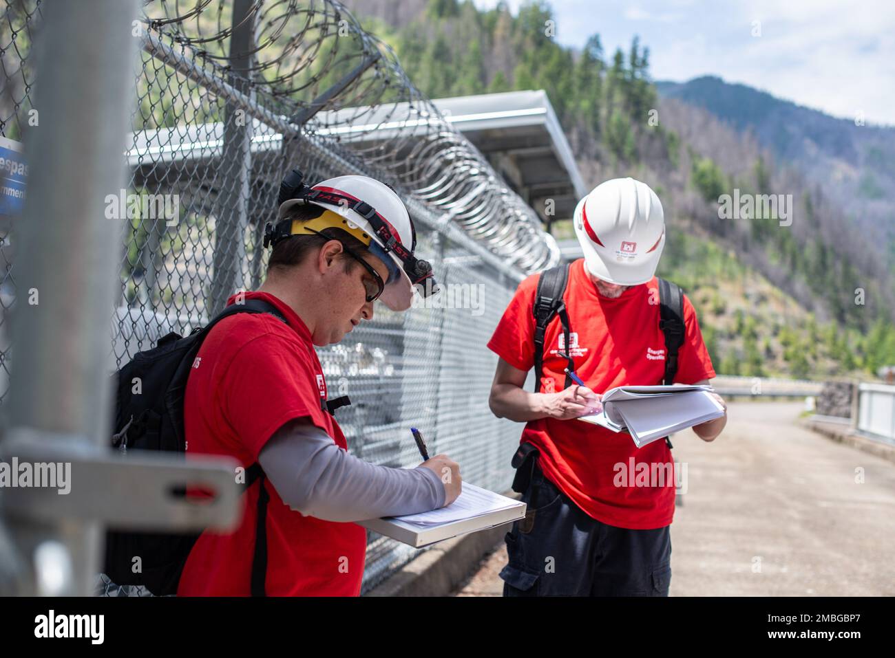 Alex Hammond (left), dam safety program manager with the Walla Walla ...