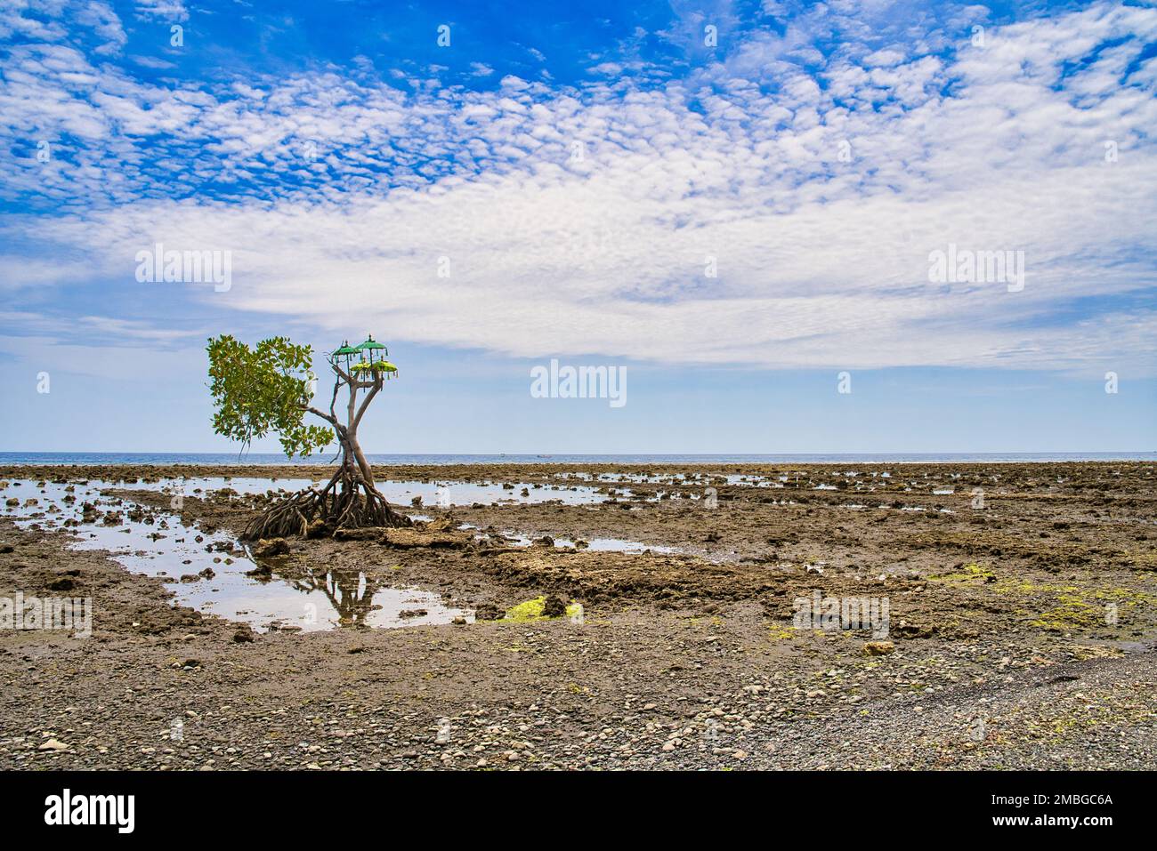 Pemuteran beach with Hindu shrine on Bali Indonesia Stock Photo - Alamy