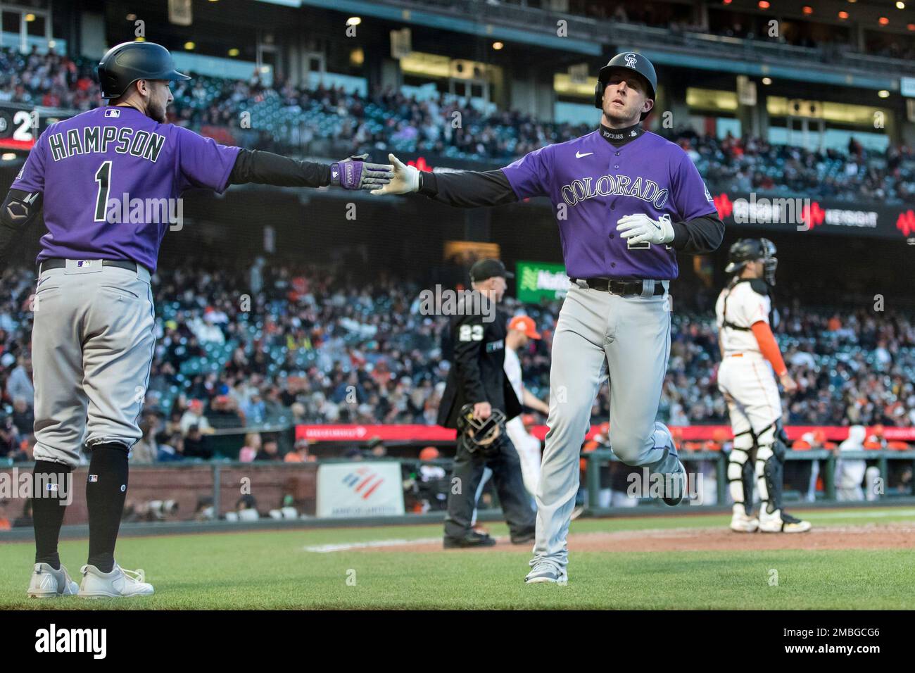 Colorado Rockies' Ryan McMahon, right, celebrates with Garrett Hampson ...