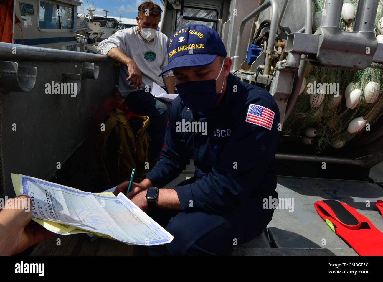 Petty Officer 3rd Class Joshua Smith, a marine inspector from Coast ...
