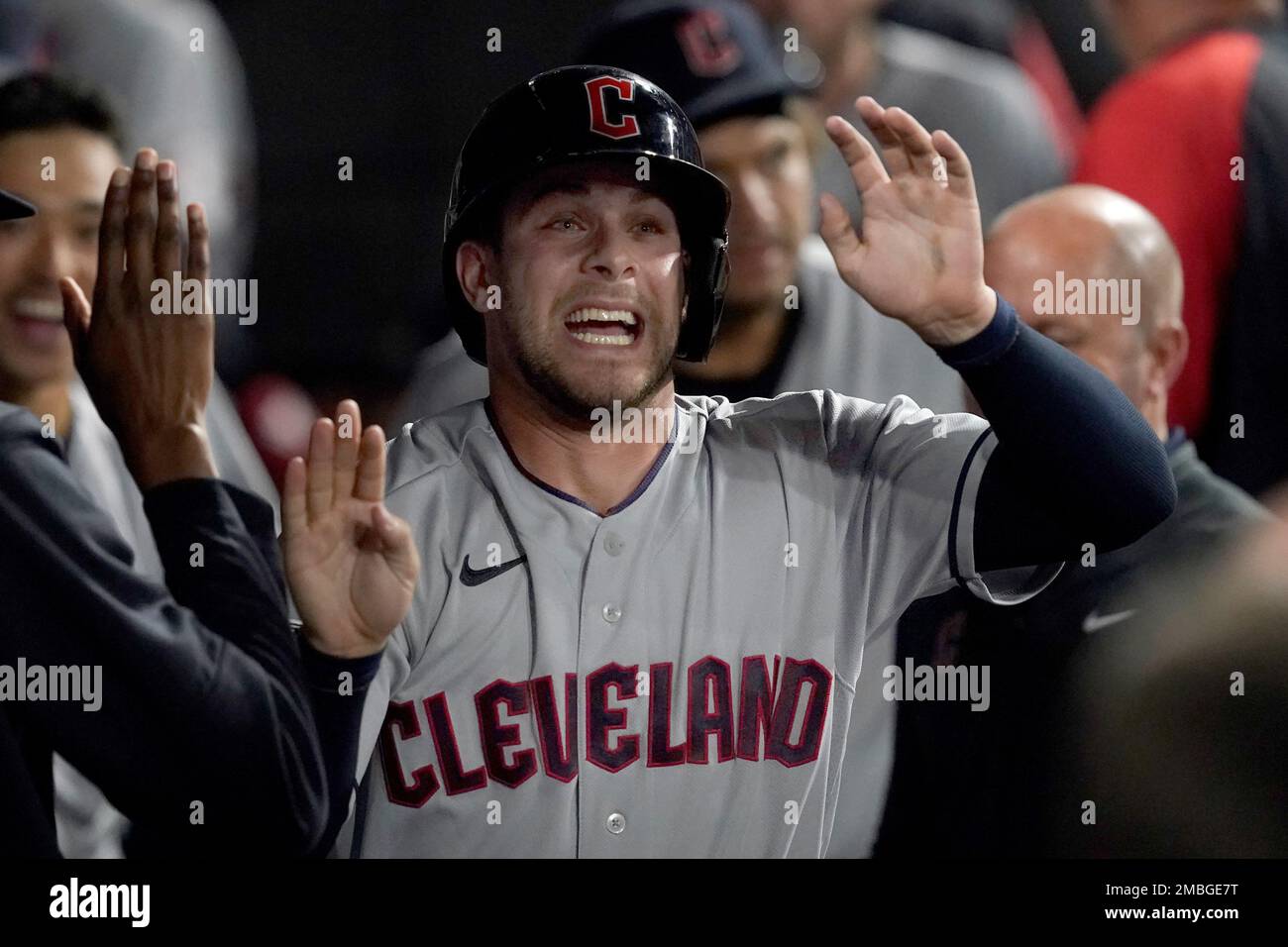Cleveland Guardians' Ernie Clement celebrates in the dugout after ...