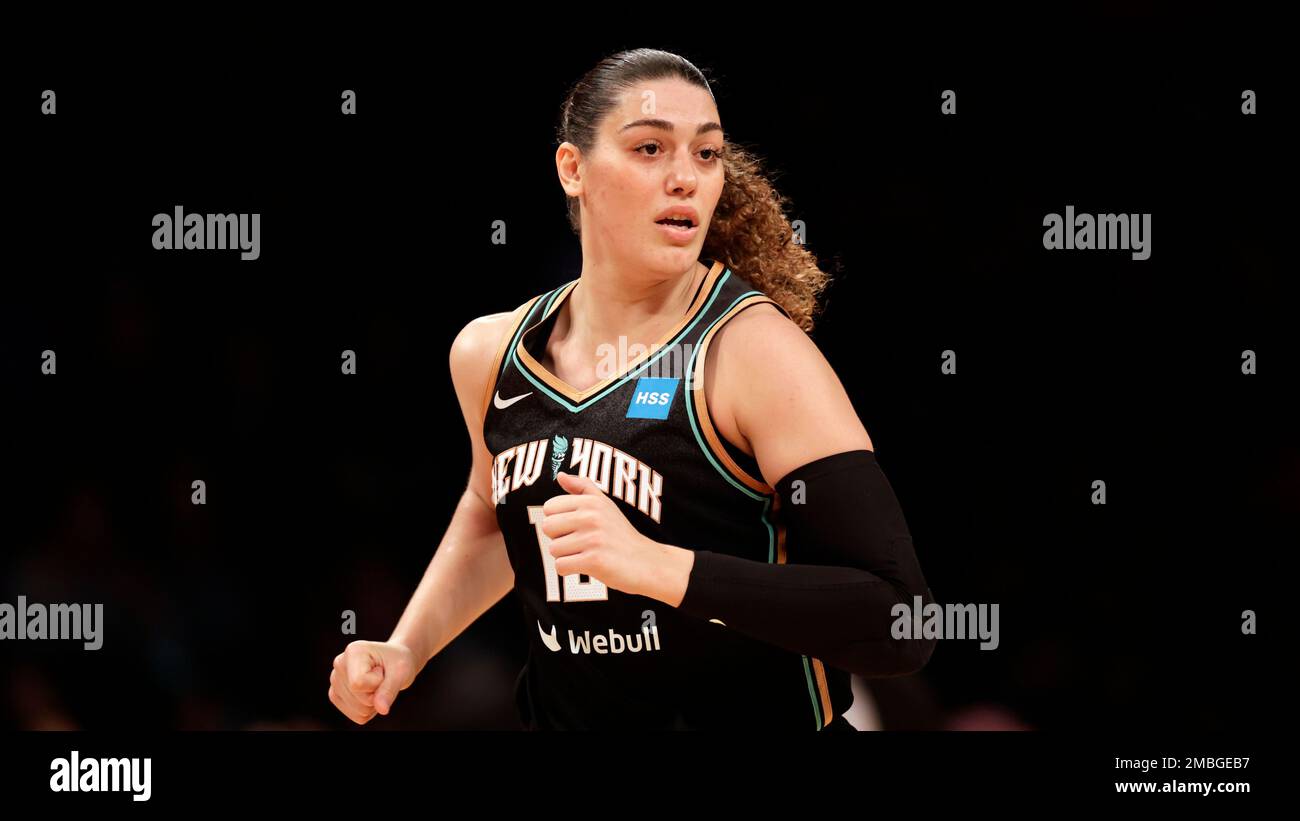 New York Liberty center Lorela Cubaj (18) reacts against the ...