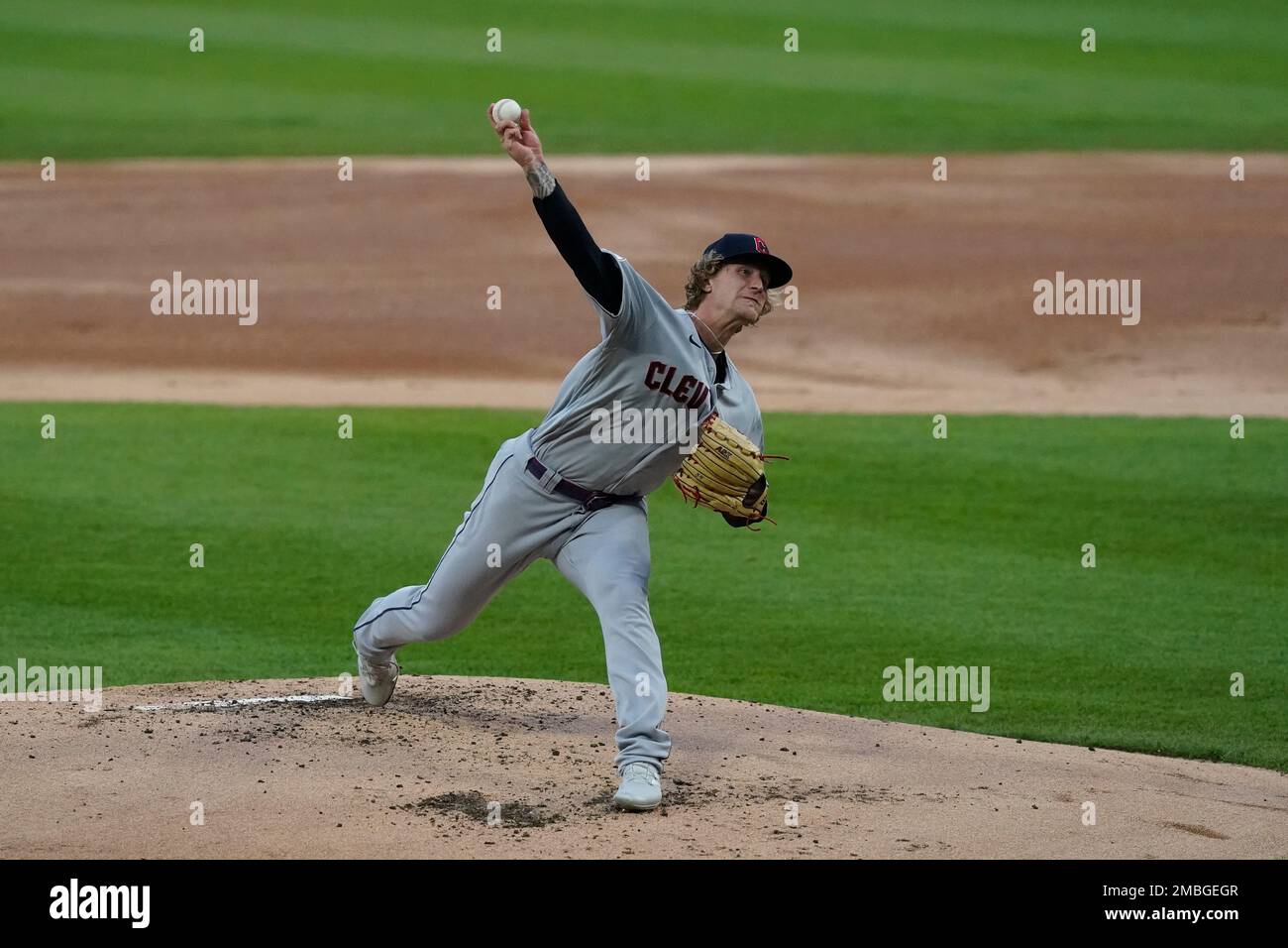 Cleveland Guardians starting pitcher Zach Plesac delivers during a ...