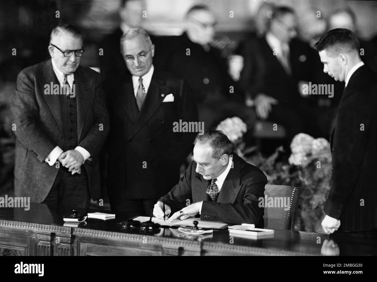 FILE - Secretary of State Dean Acheson signs the Atlantic defense ...