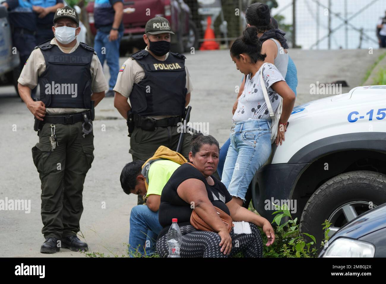 Relatives wait outside Bellavista prison where a deadly riot broke out ...