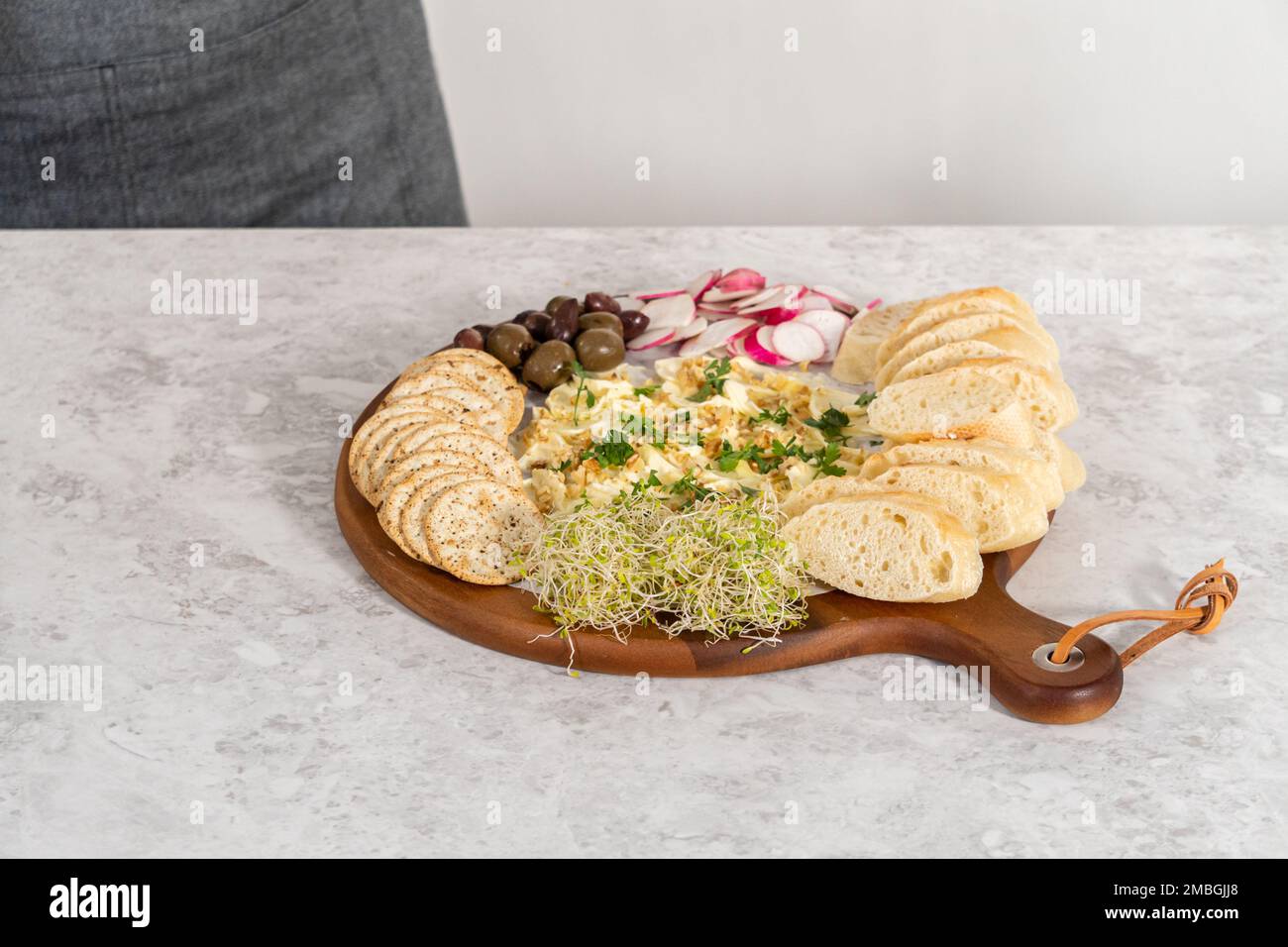 Butter board with vegetables and bread Stock Photo - Alamy