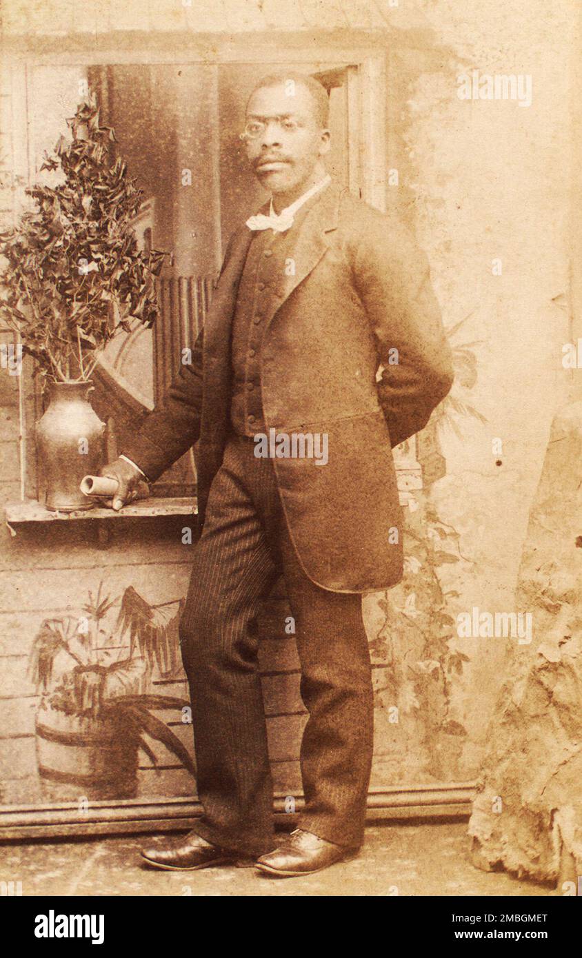 Full-length portrait of man, with studio props, c1880-c1889 Stock Photo ...