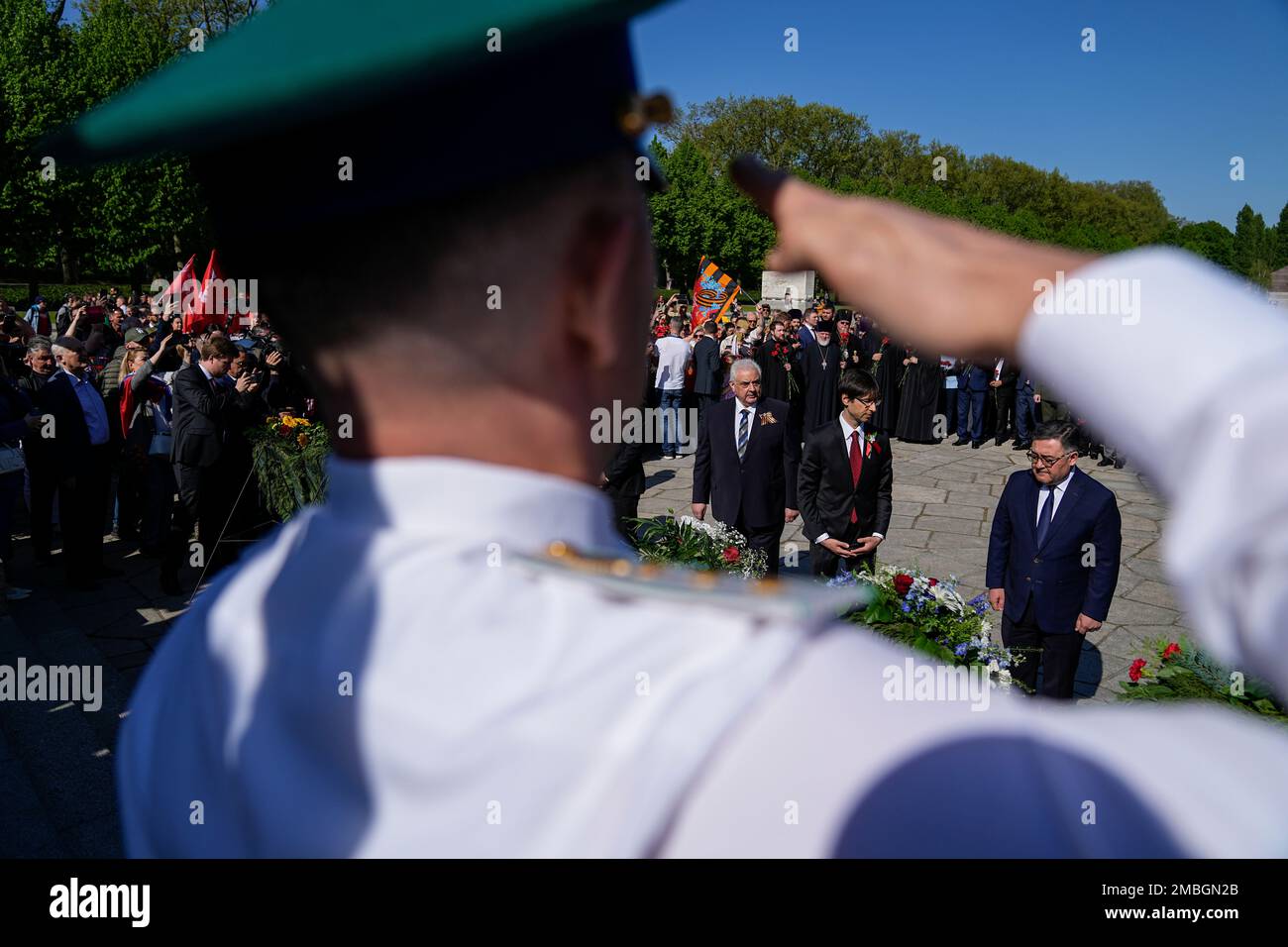 Russian ambassador in Germany Sergey Nechayev, center, attends ...