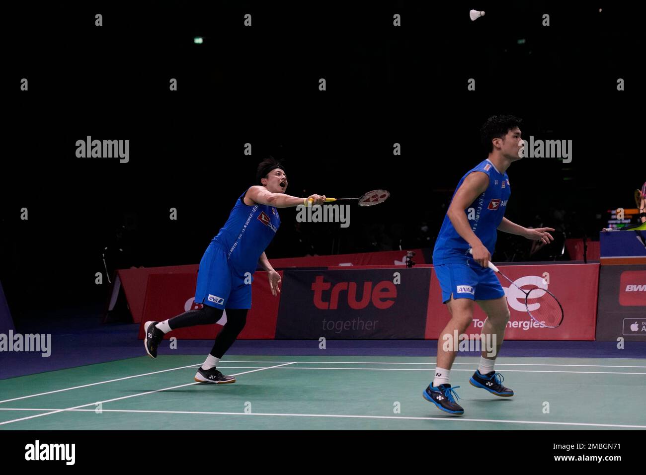 Japan's Akira Koga, left, and Taichi Saito, returns a shot to U.S. Enrico Asuncion, William Hu ...