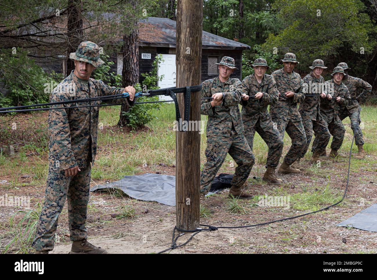 U.S. Marines with Marine Corps Engineer School, participate in rigging ...