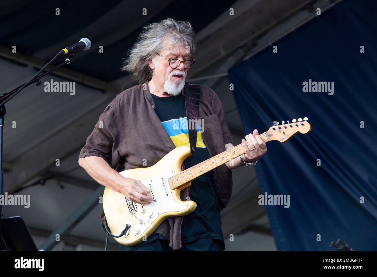 Dave Malone, of The Radiators, performs at the New Orleans Jazz and ...
