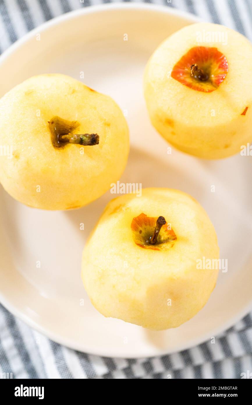 Peeled red apples Stock Photo - Alamy