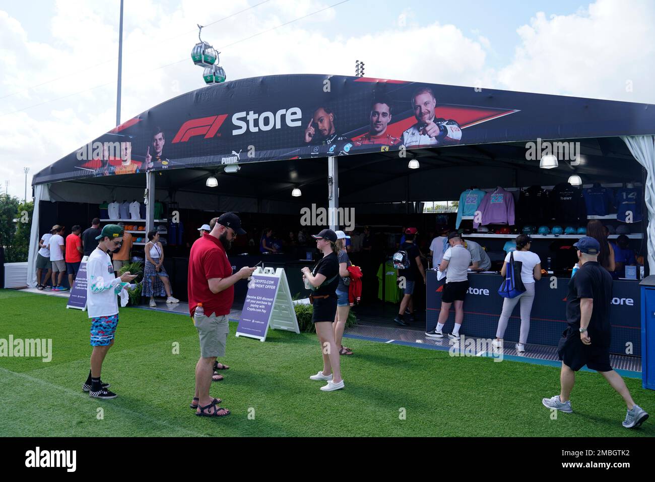 Racing fans look for team merchandise in a shop at the Formula One ...