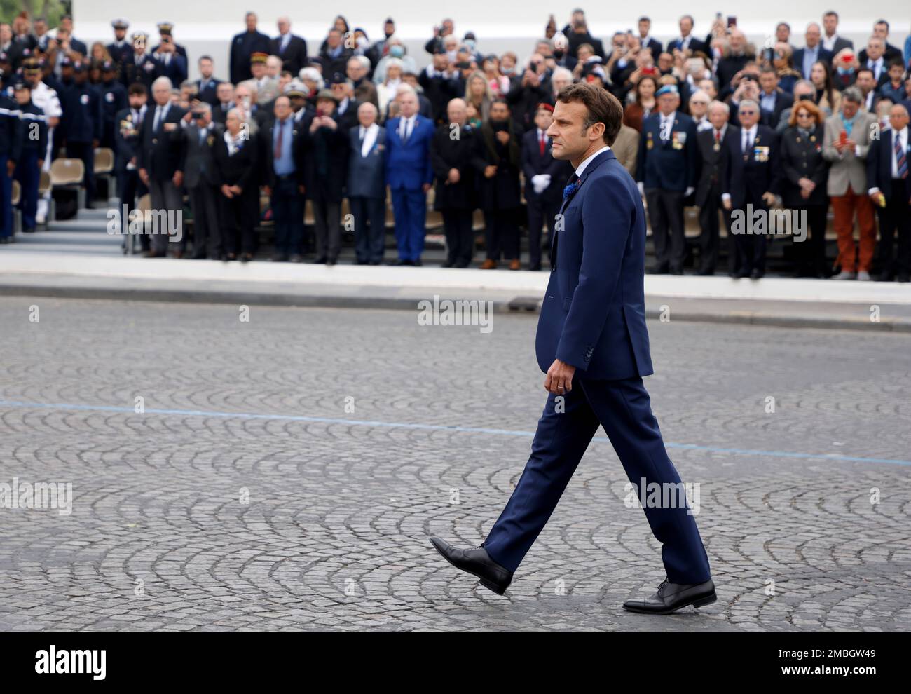 France's President Emmanuel Macron, walks during a ceremony to mark the ...