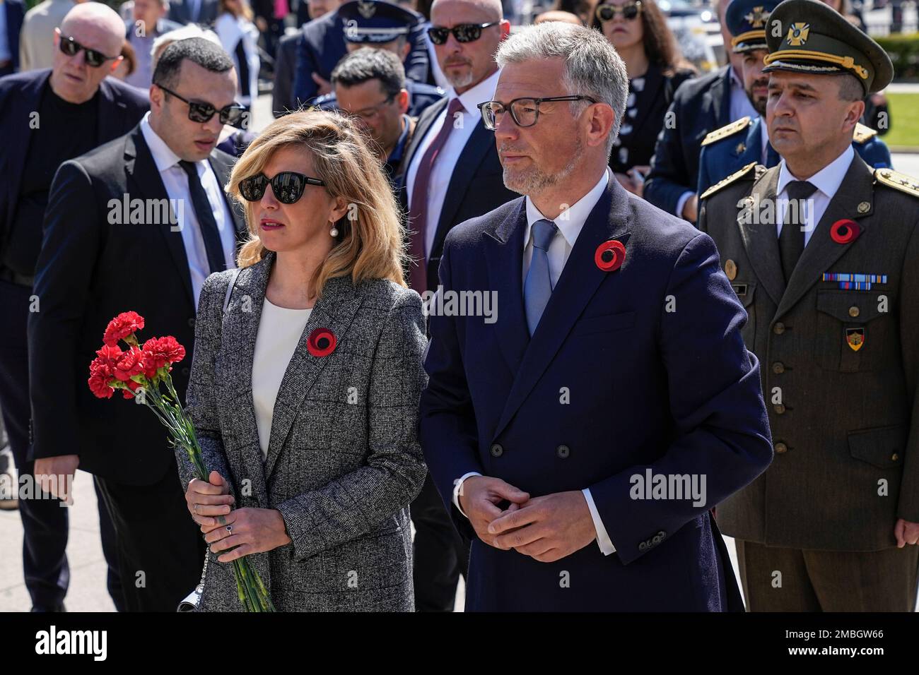 Ukrainian ambassador Andrij Melnyk, center right, and his wife Svitlana ...