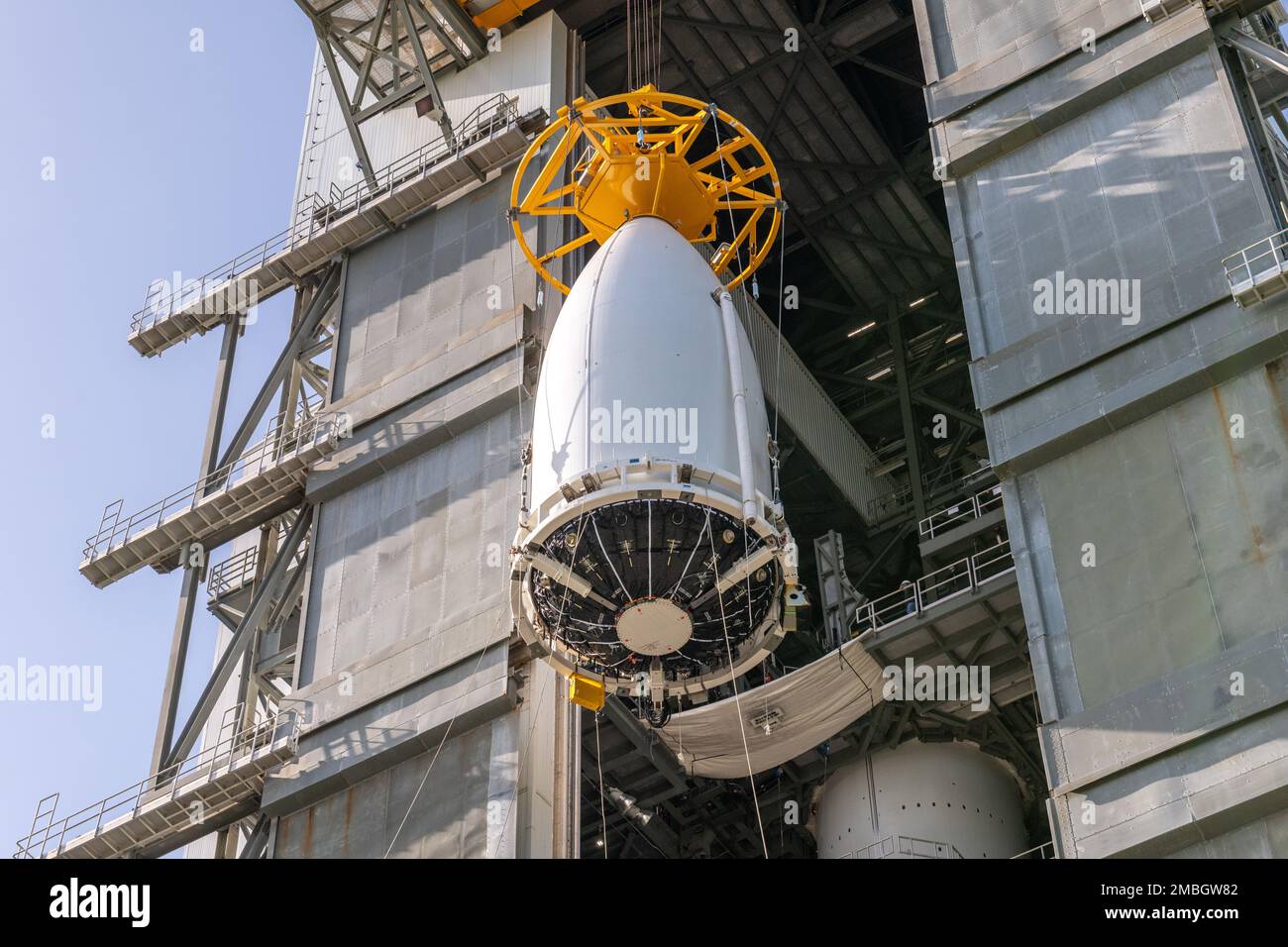 The USSF-12 payload is hoisted to the top of the Atlas V rocket at Cape ...