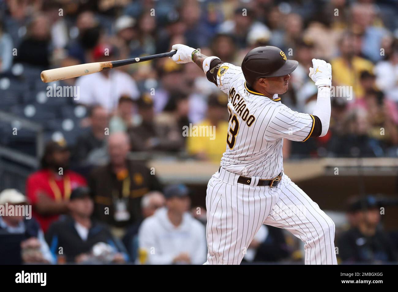 San Diego Padres' Manny Machado watches his hit in the first inning of ...
