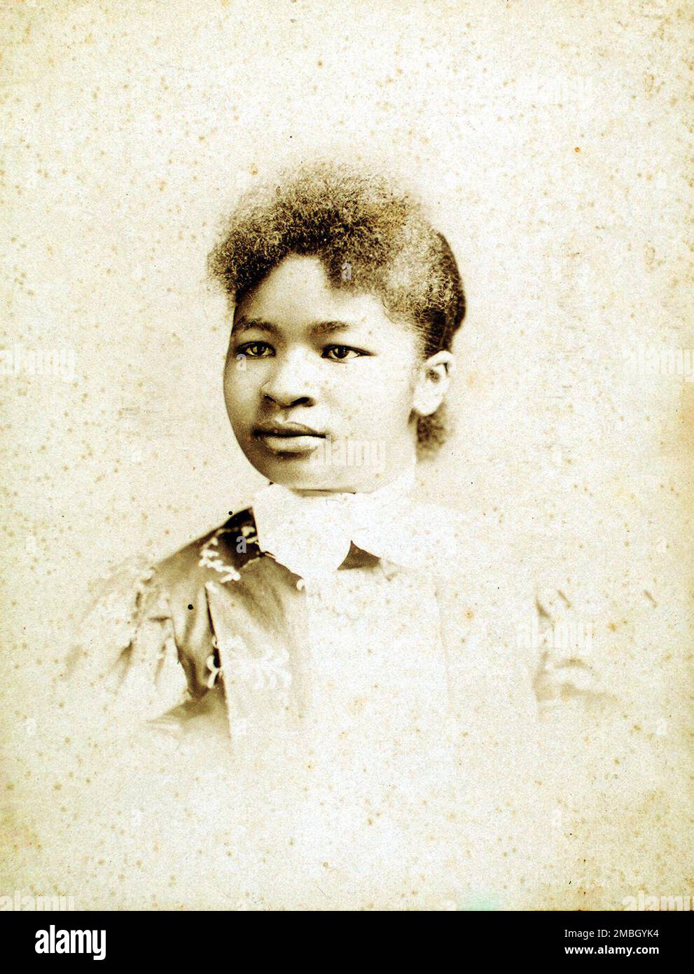 Studio portrait of young woman, head turned to her right, (1880-1900 Stock Photo - Alamy