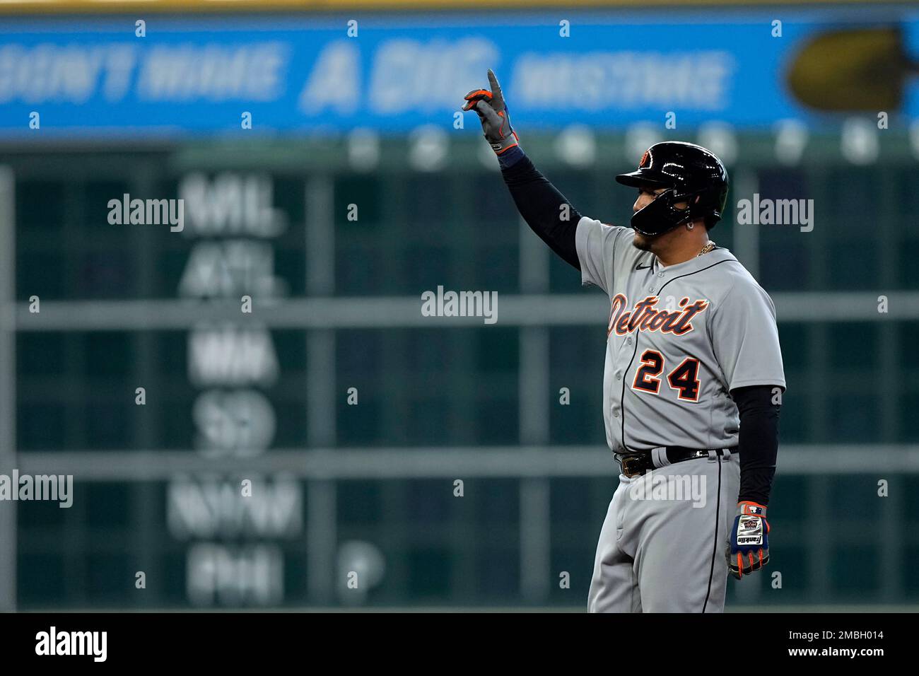 Detroit Tigers' Miguel Cabrera raises his hand after hitting a two-run ...