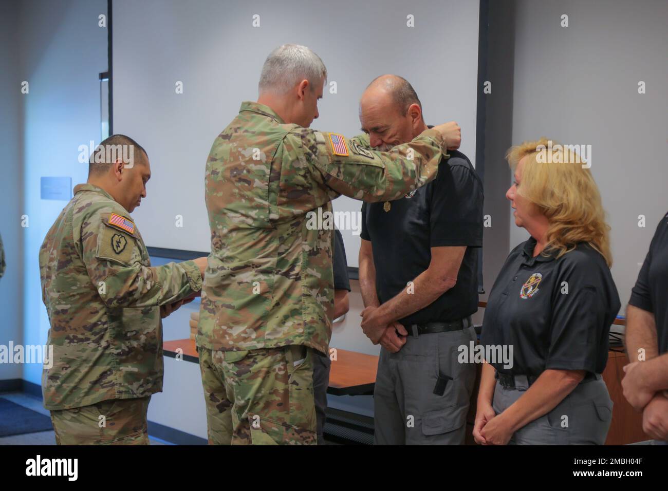Col. Vincent Myers, the BACH Commander, and Col. Andrew Jordan, the ...