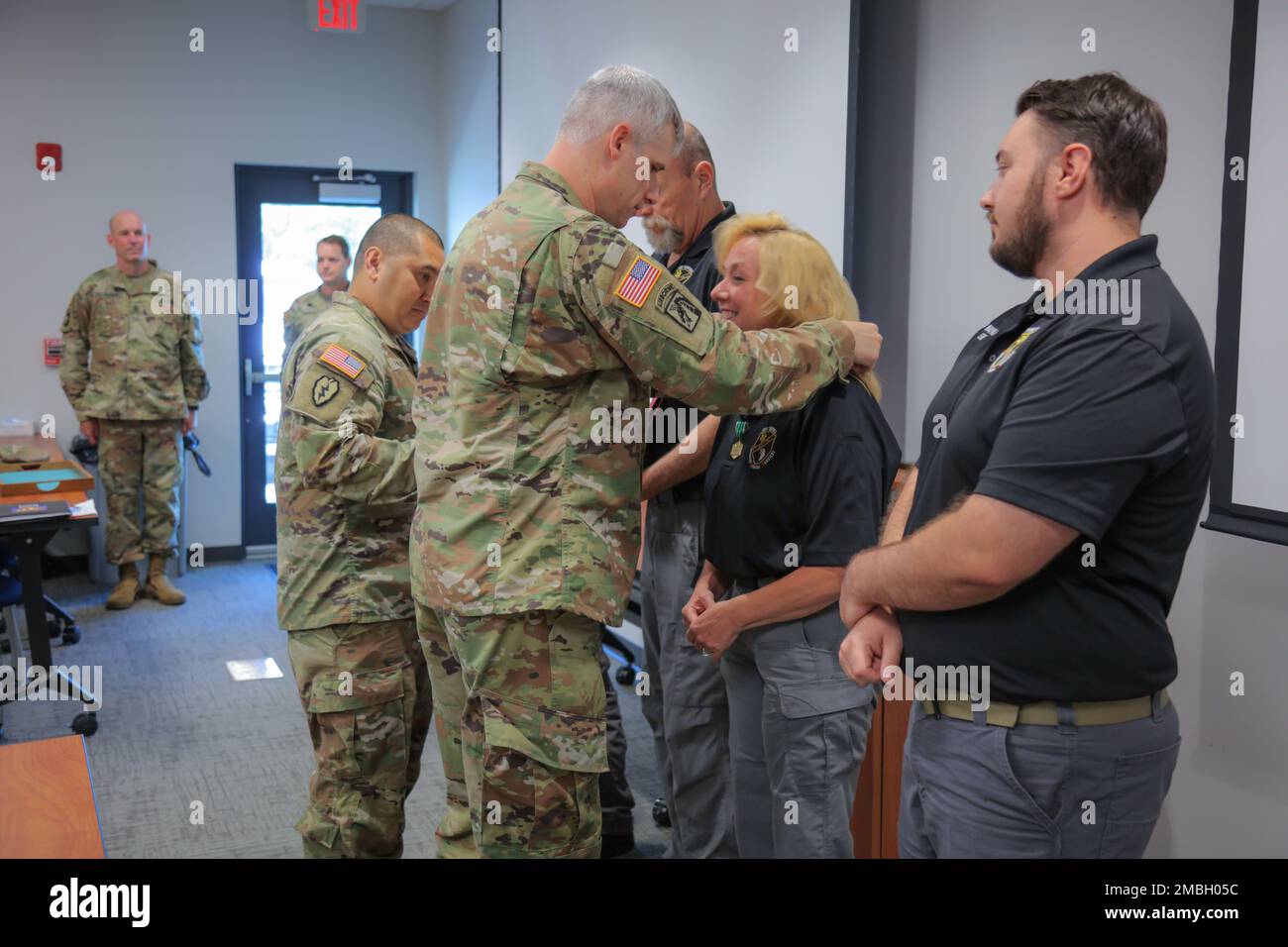 Col. Vincent Myers, the BACH Commander, and Col. Andrew Jordan, the ...