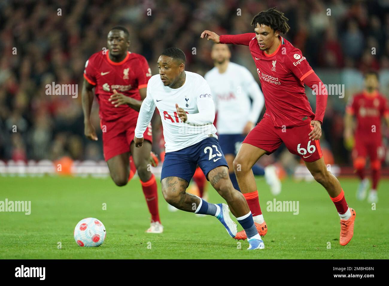 Tottenham's Steven Bergwijn, left, is challenged by Liverpool's Trent ...