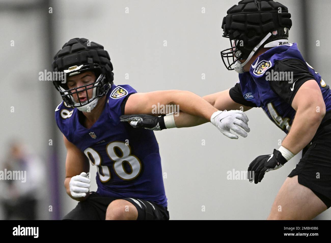 Baltimore Ravens tight end Charlie Kolar, left, during an NFL football ...