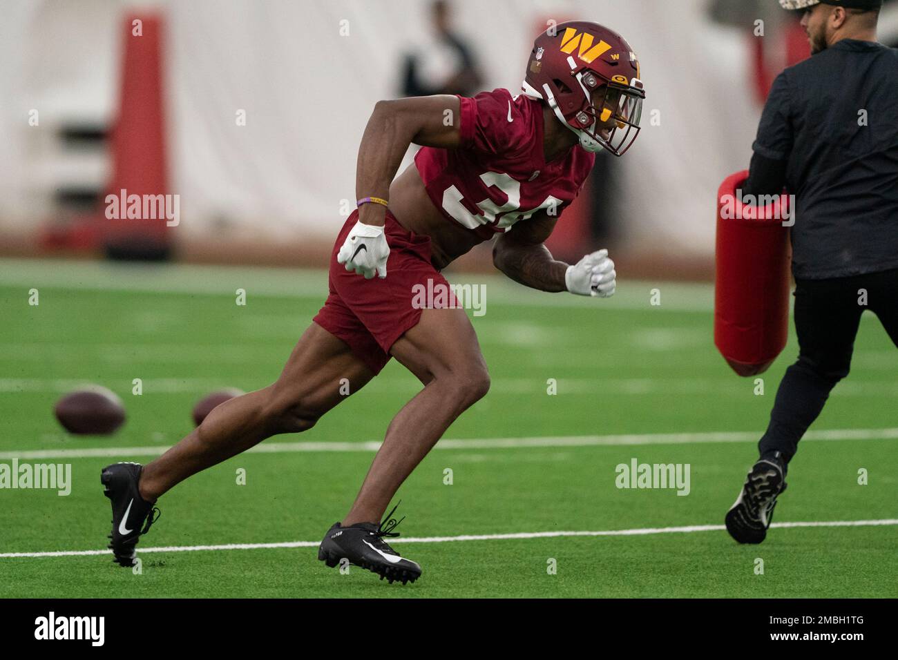 Washington Commanders corner back Christian Holmes runs during Rookie ...