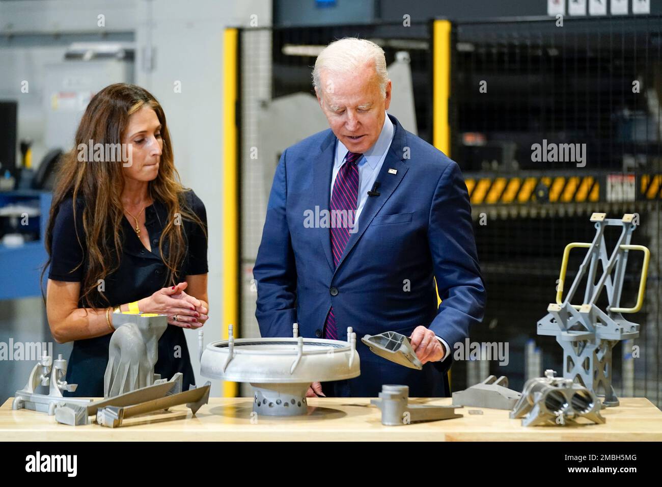 President Joe Biden speaks with Joanna Zelaya, CEO of Chicago Precision ...