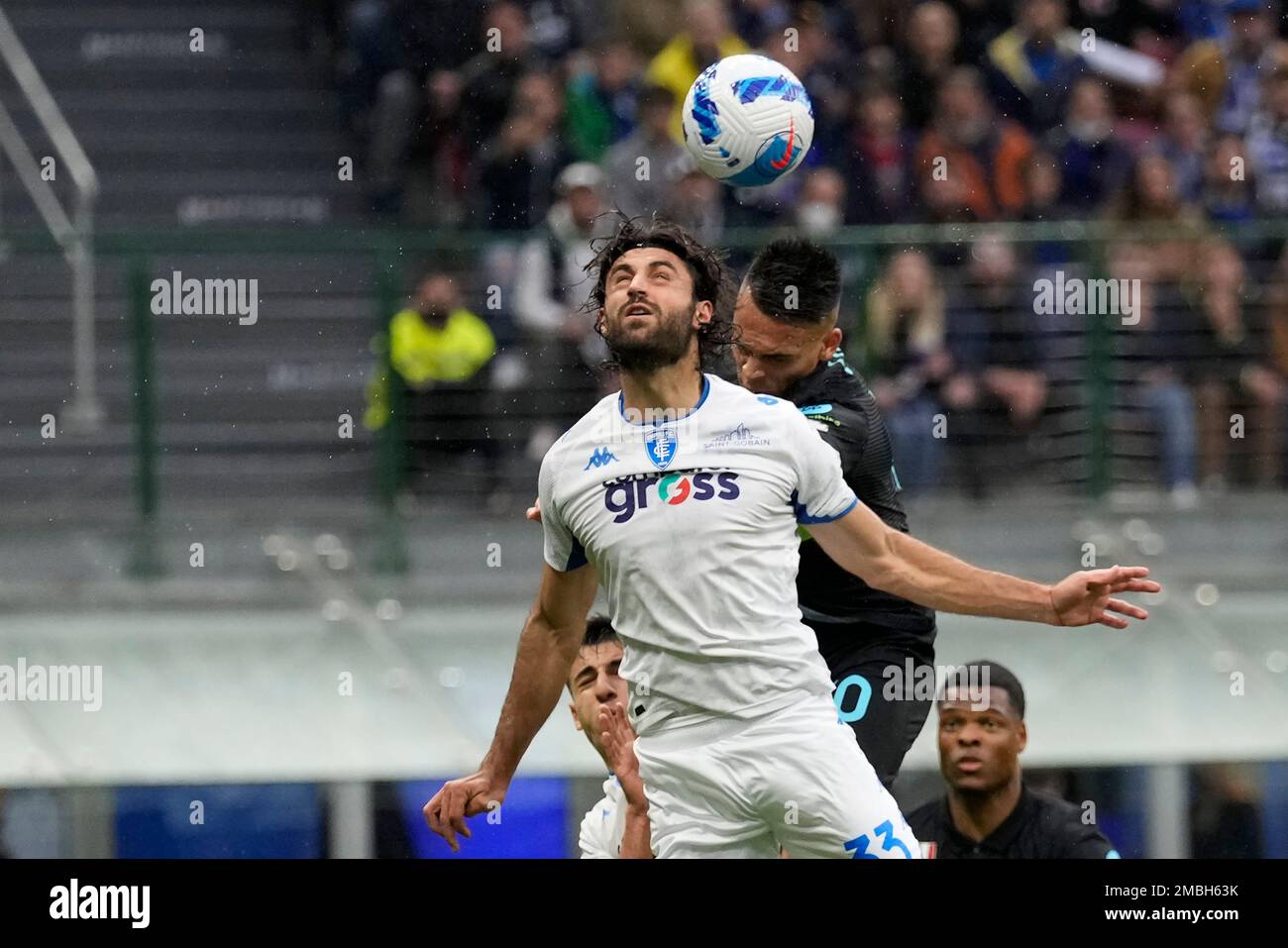 Inter Milan's Lautaro Martinez, rear, and Empoli's Sebastiano Luperto ...