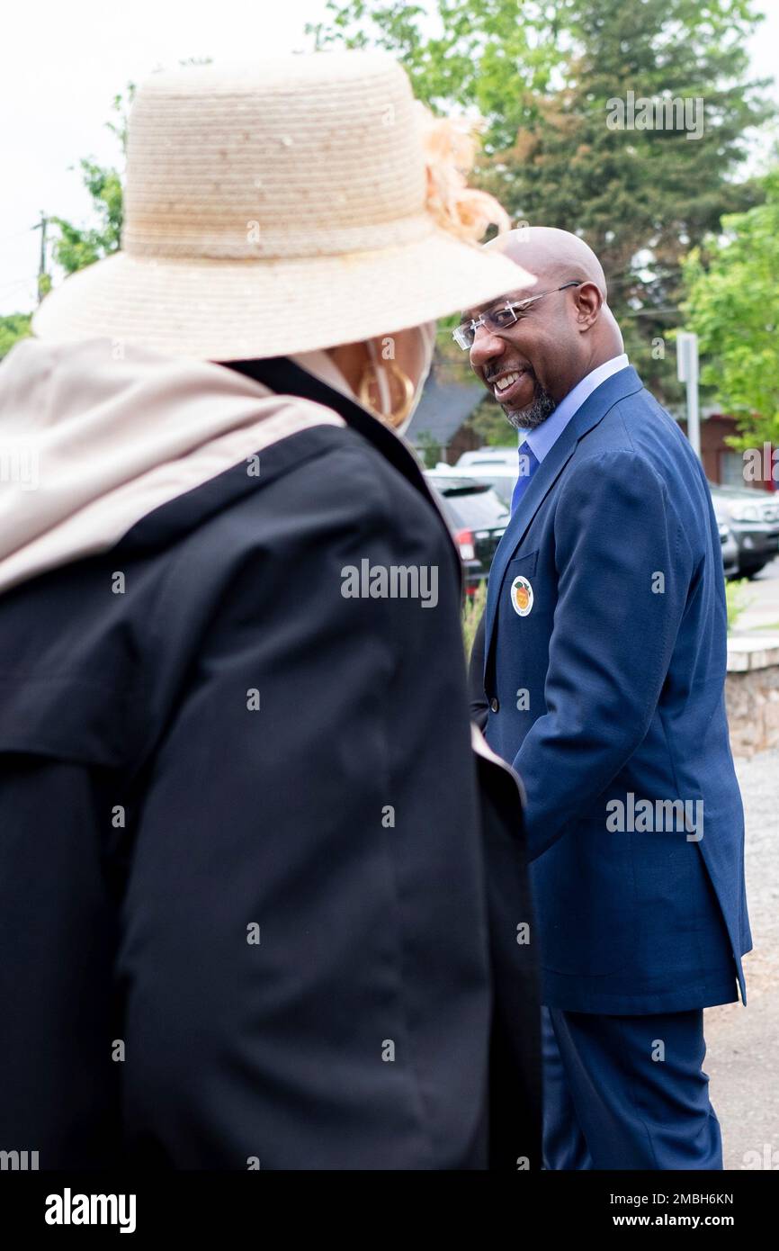 U.S. Sen. Rev. Raphael Warnock smiles back at Wyvonia Carter after he ...
