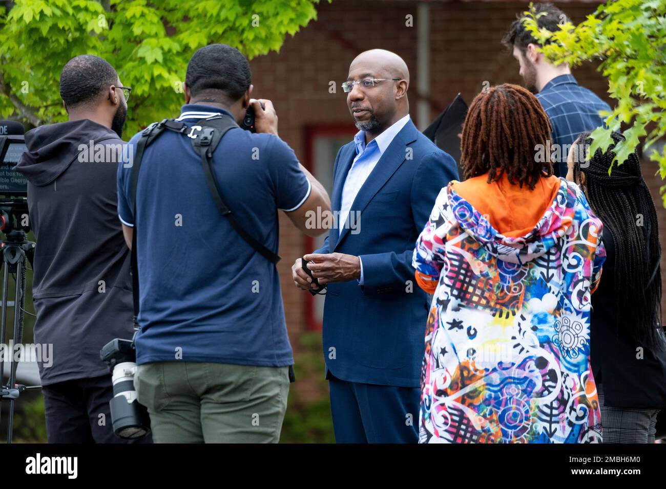 U.S. Sen. Rev. Raphael Warnock arrives to casts his primary ballot ...