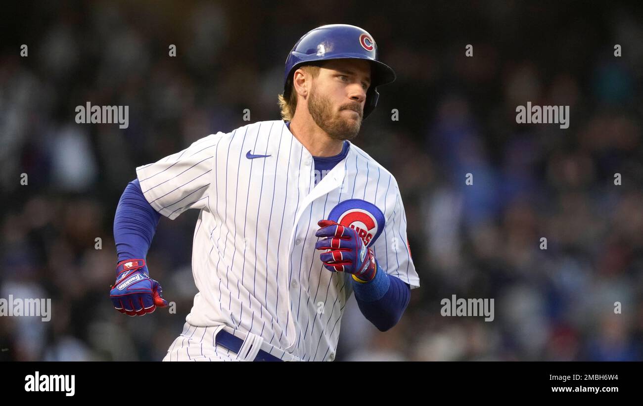 Chicago Cubs' Patrick Wisdom rounds the bases after his home run in a ...