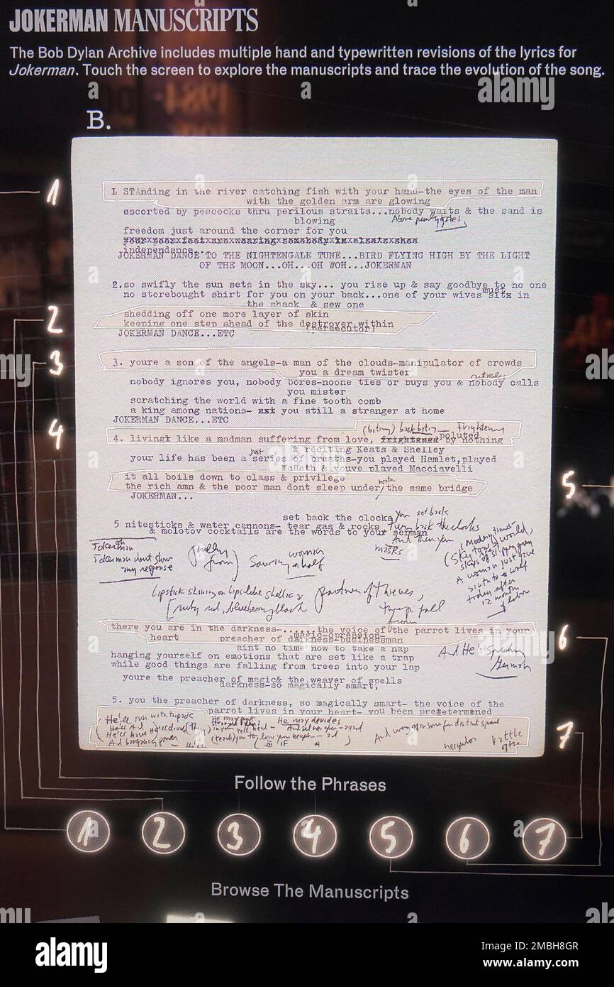 A manuscript for "Jokerman" is viewed in an interactive display at the ...