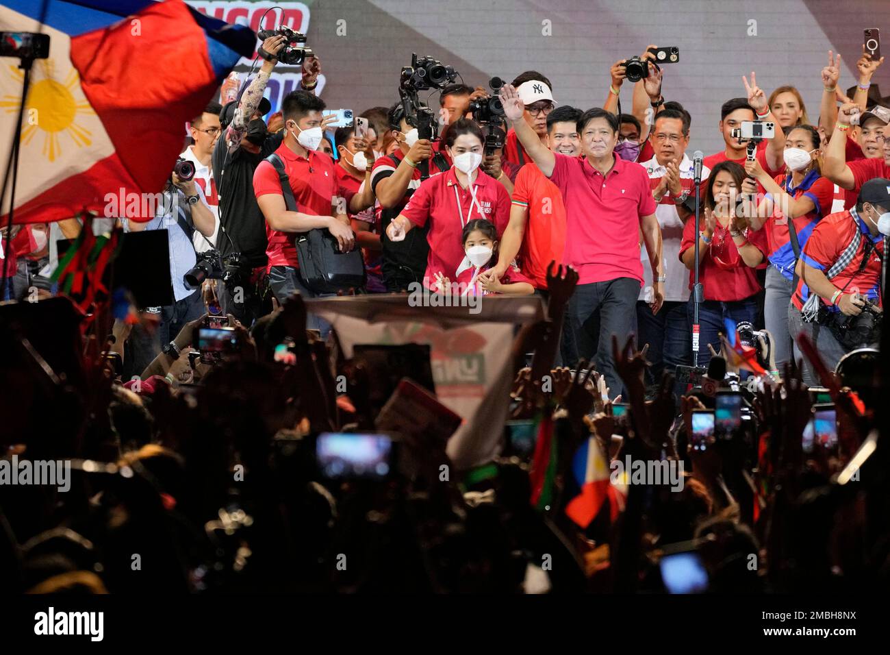 Ferdinand "Bongbong" Marcos Jr. waves to the crowd during a campaign ...