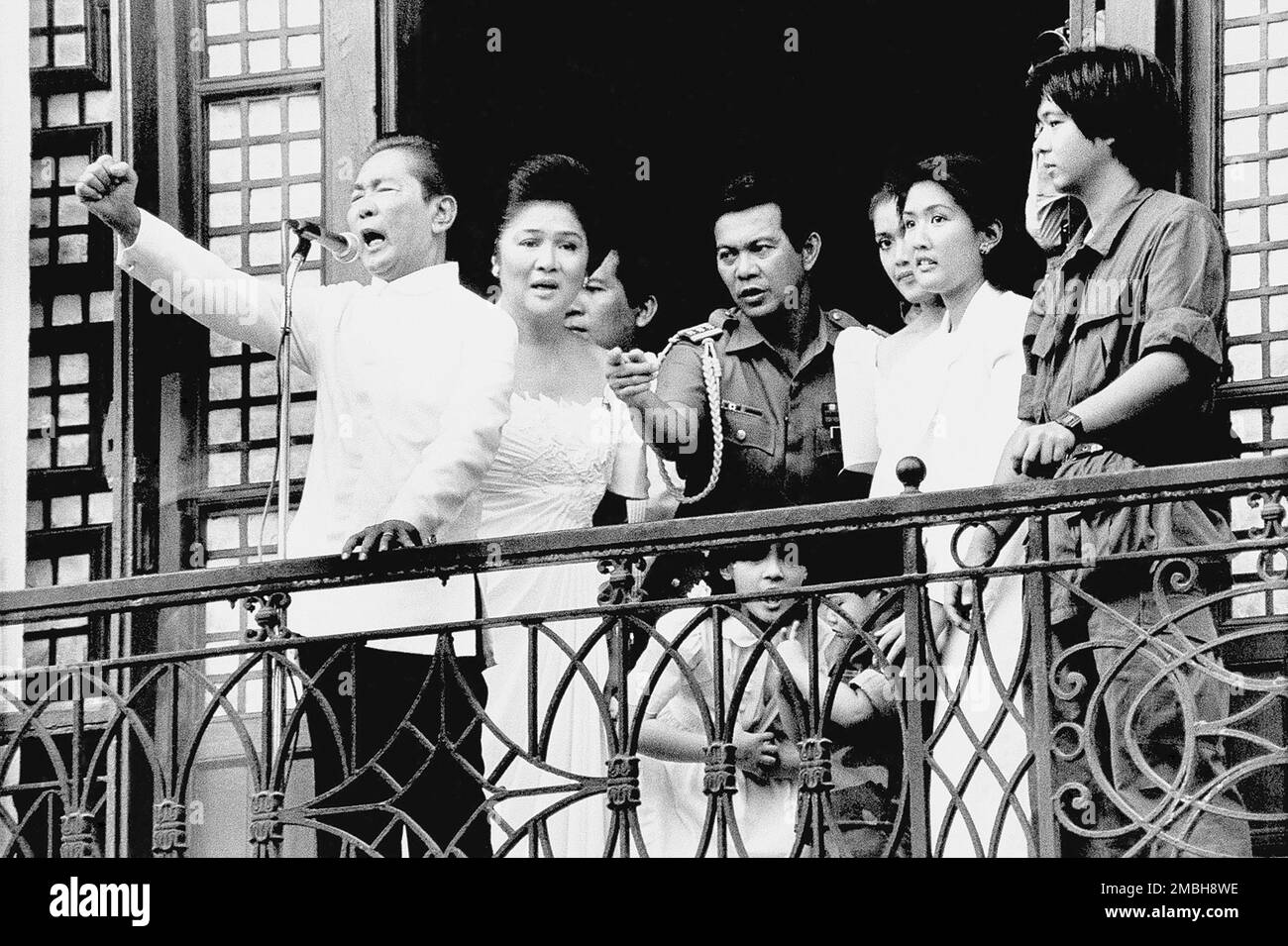 FILE - Ferdinand Marcos, with his wife Imelda at his side and Ferdinand ...