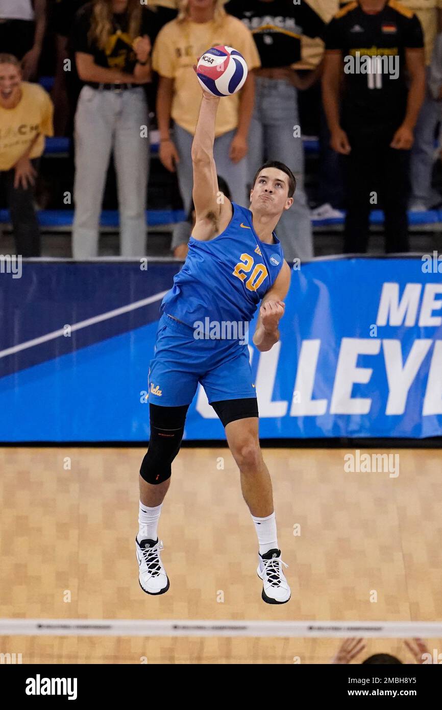 UCLA outside hitter Ethan Champlin servers against Long Beach State ...