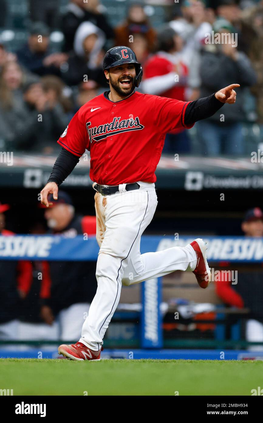Cleveland Guardians' Austin Hedges scores on a home run by Steven Kwan ...
