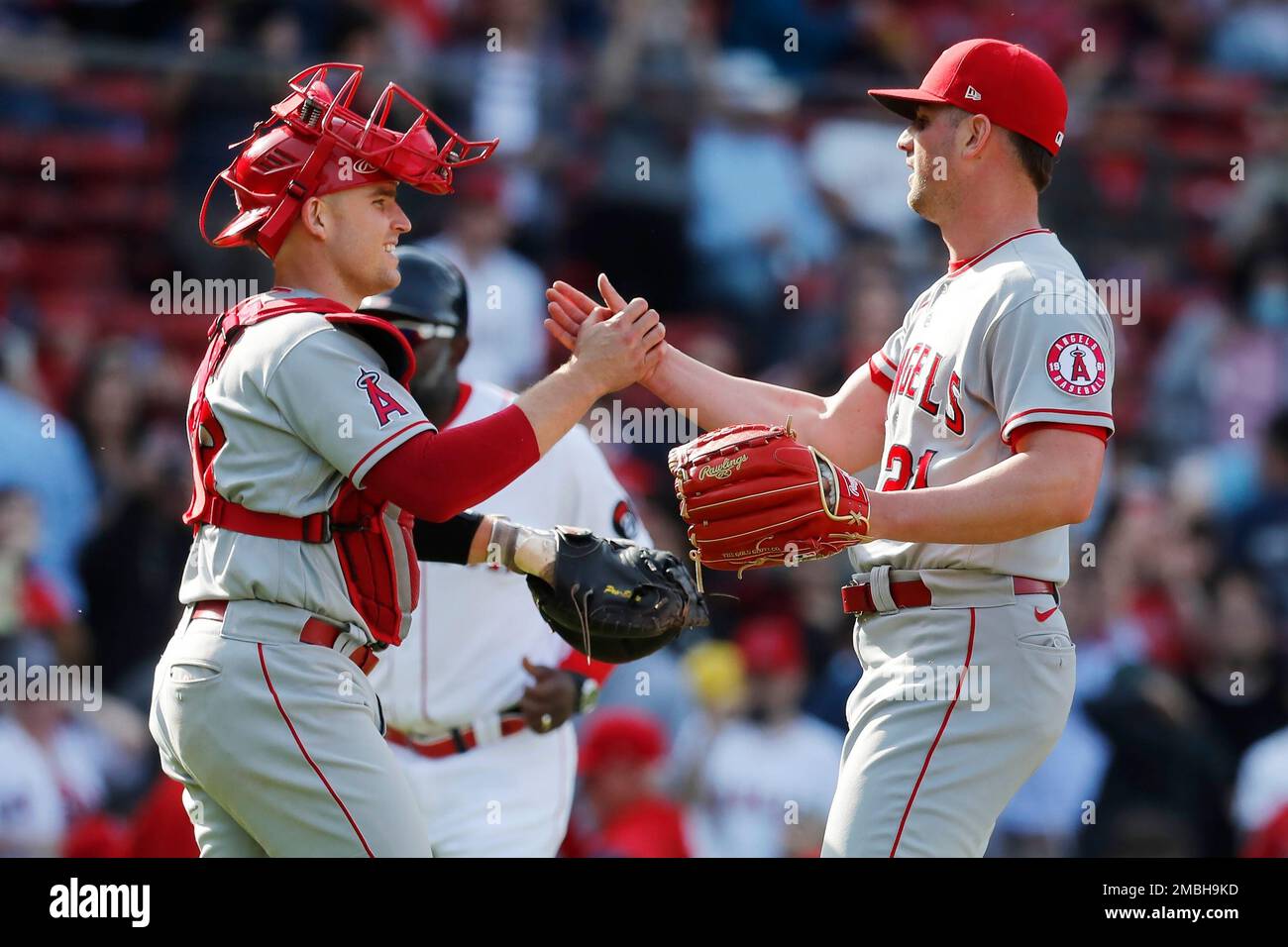 Los Angeles Angels' Mike Mayers (21) and Max Stassi celebrate after ...