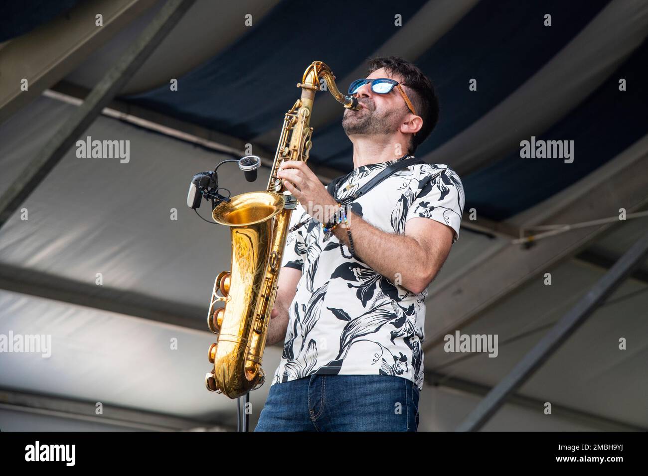 Eric Vogel of the New Orleans Suspects performs at the New Orleans Jazz ...