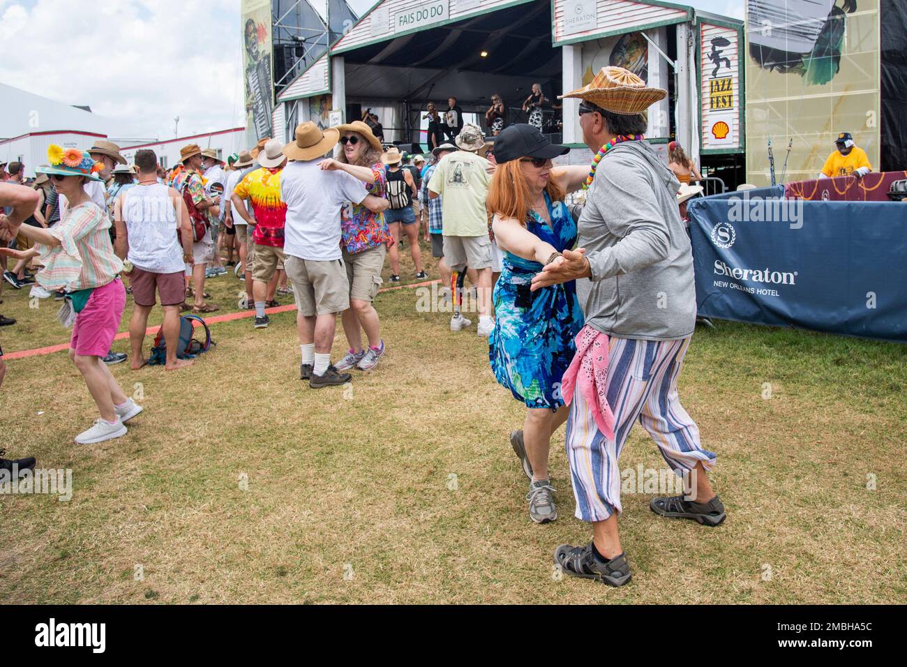 Festivalgoers are seen at the New Orleans Jazz and Heritage Festival ...