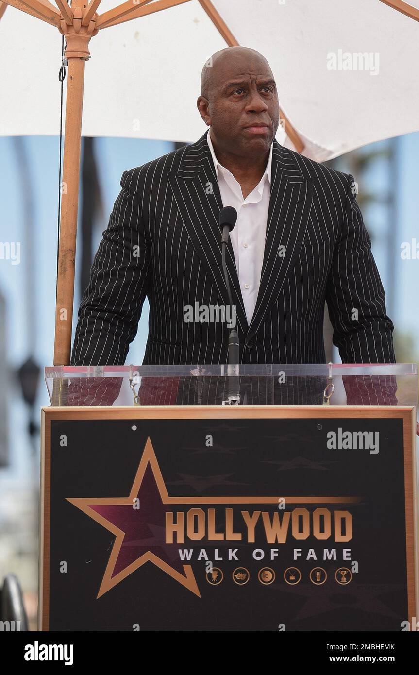 Magic Johnson attends a ceremony honoring Greg Mathis with a star on ...