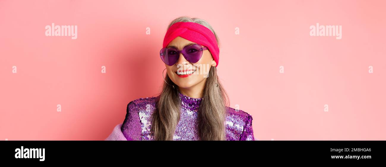 Fashion. Close up of stylish senior woman smiling happy at camera ...