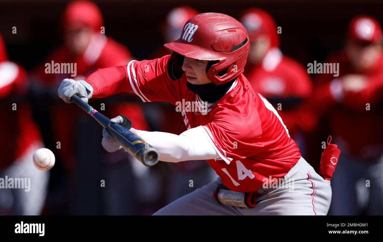 Miami's JJ Woolwine bats during an NCAA baseball game on Sunday, April ...